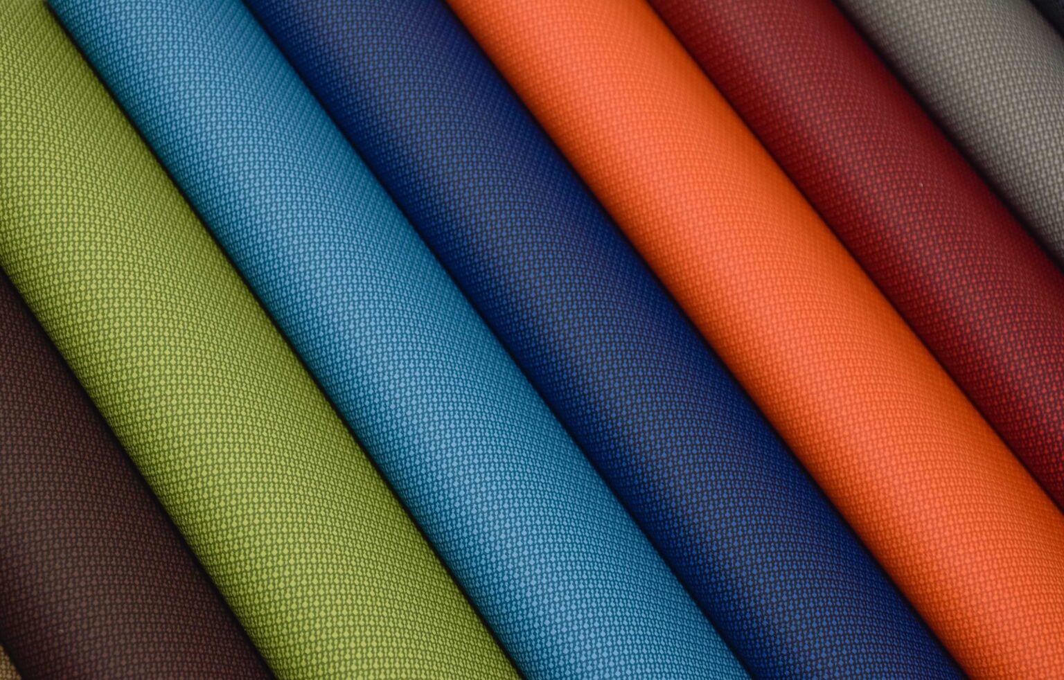 About Us | Ambla Vinyl Upholstery Fabrics | Plastic Coated Fabric